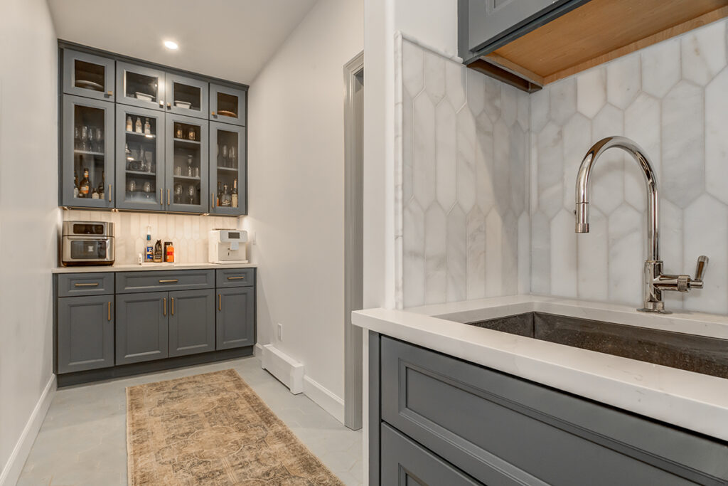 Full Overlay Gray Kitchen Cabinets With Gold Hardware