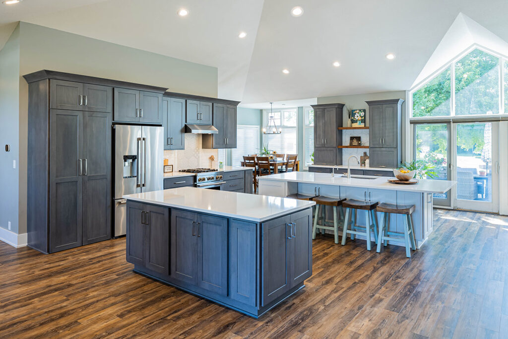 Dual Island Kitchen Featuring Dark Gray Kitchen Cabinets