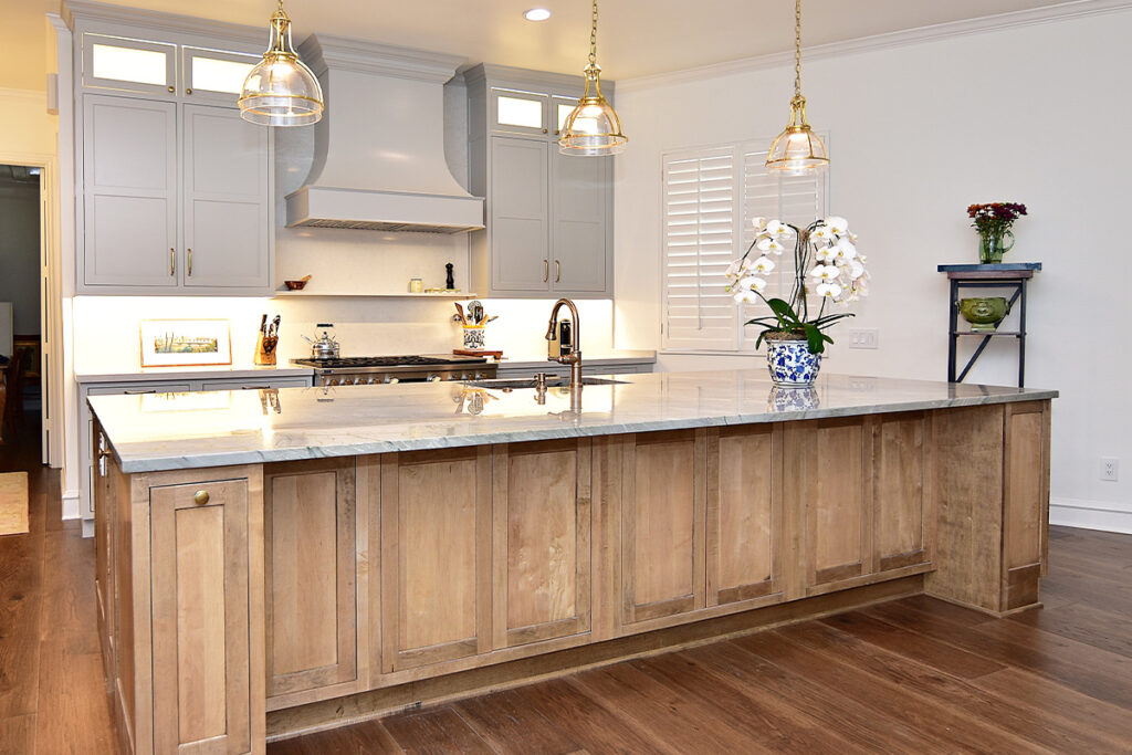 Cashew Kitchen Island with White & Gold Cabinets