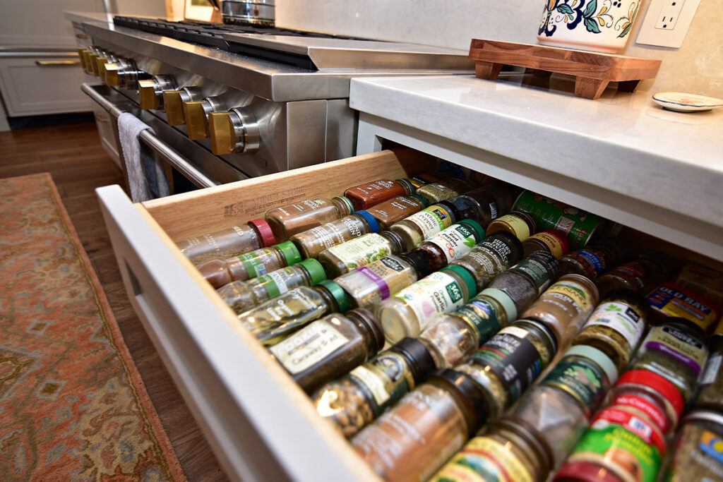 Cashew Kitchen Island with White & Gold Cabinets