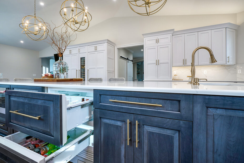 Large Family Kitchen With Dark Blue Kitchen Island