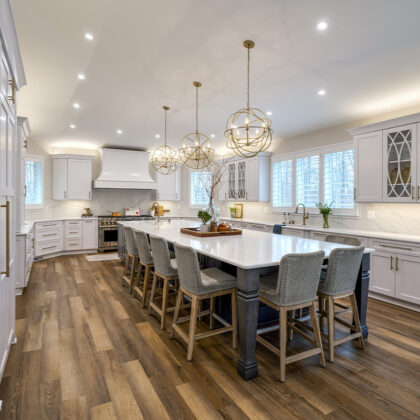 Large Family Kitchen With Dark Blue Kitchen Island