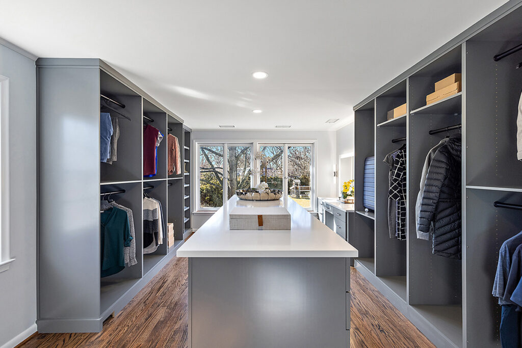 Walk-In Closet With Island Cabinets - Ensuite Dressing Room