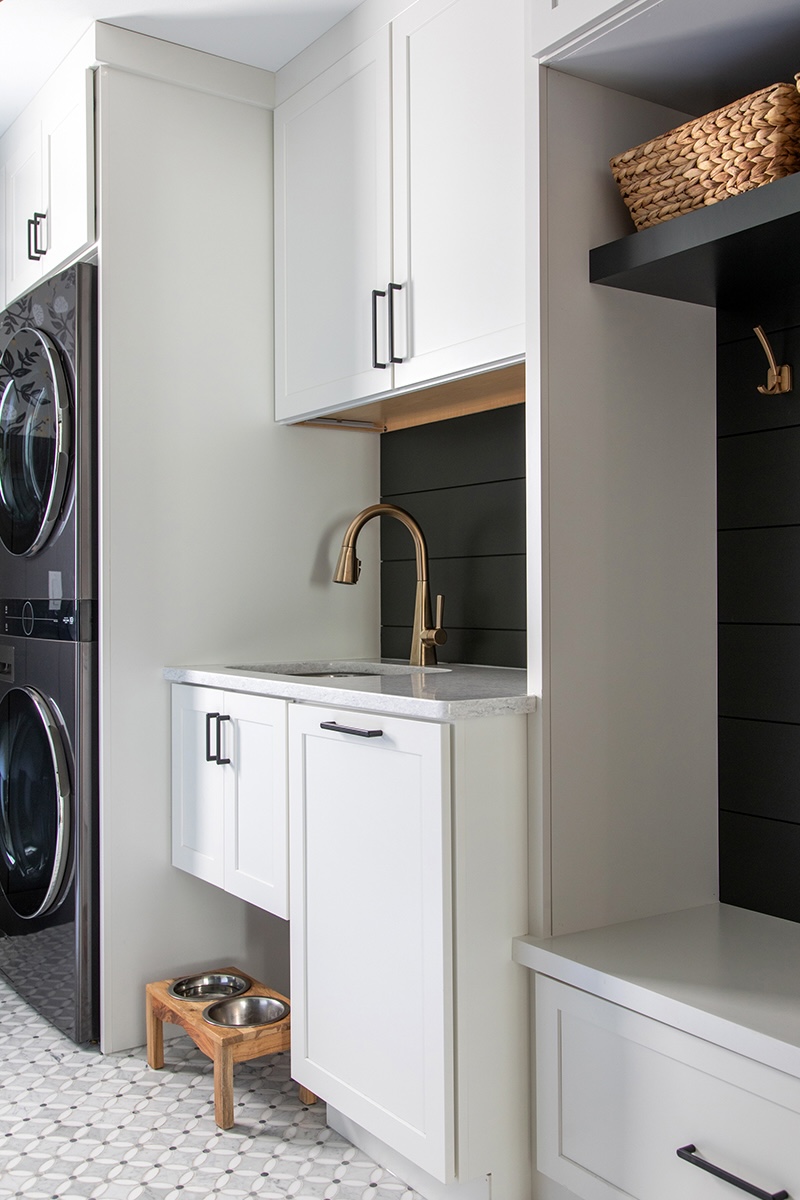 Multi-Purpose Laundry Room with White Cabinets